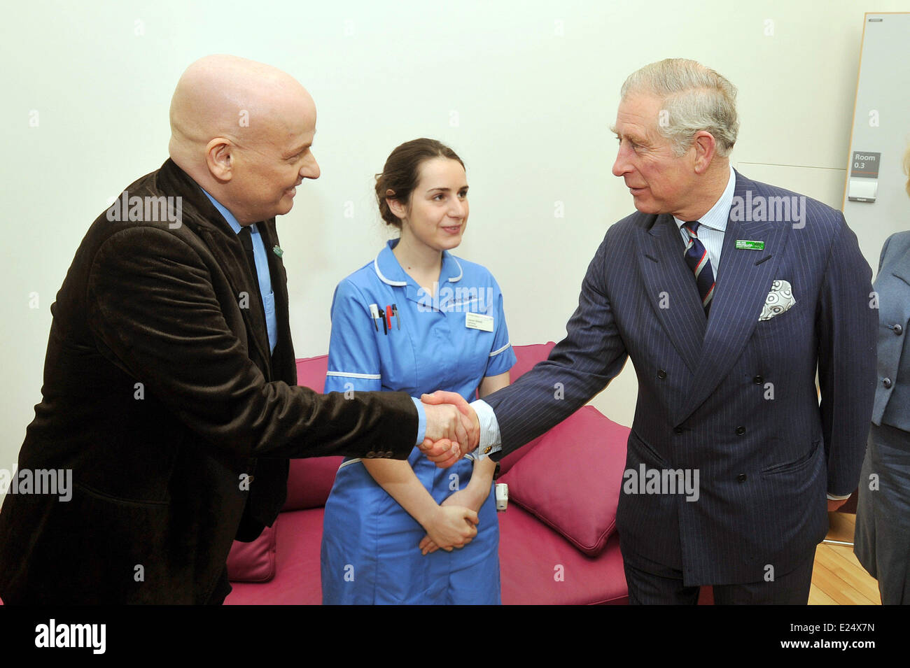 The Prince of Wales shakes hands with Chris Hemblade a cancer patient ...