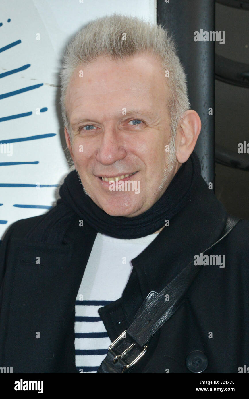 French designer Jean-Paul Gaultier signs a drawing and his autograph on ...