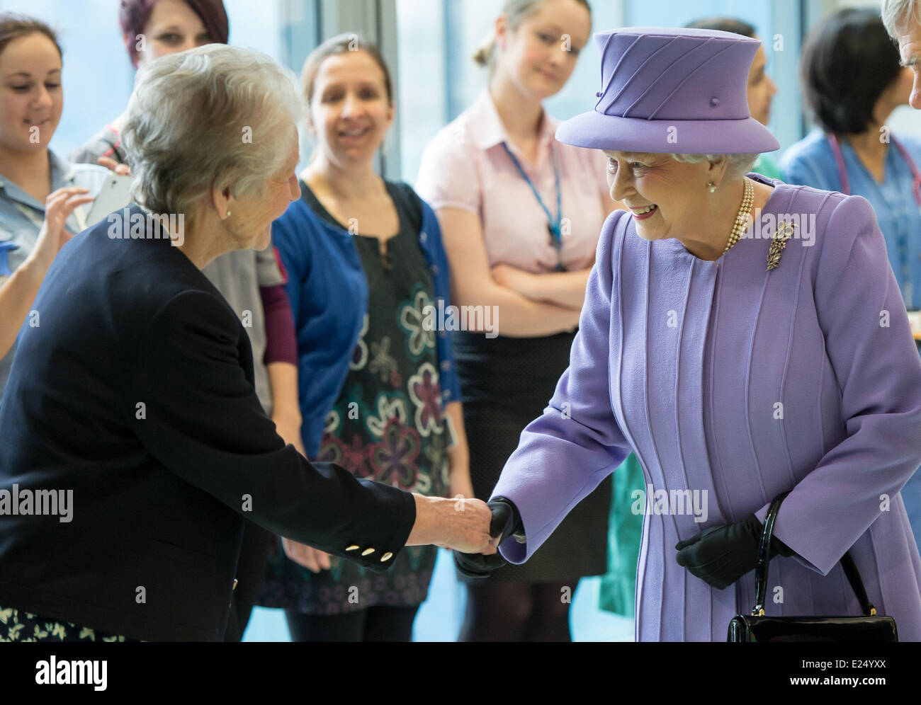Queen Elizabeth II and Prince Philip, Duke of Edinburgh meet staff as ...