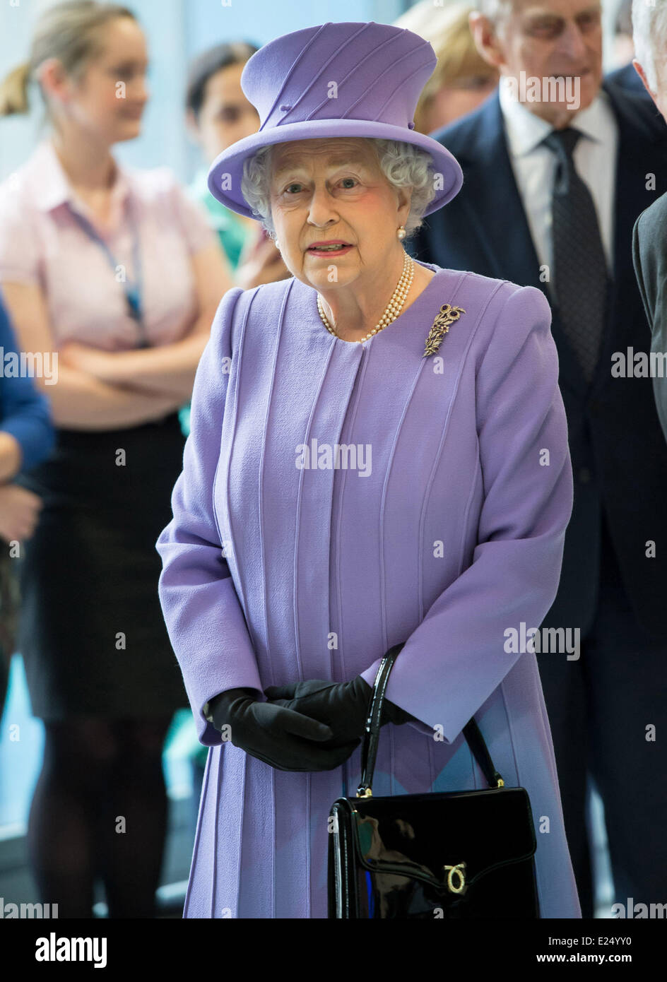 Queen Elizabeth II and Prince Philip, Duke of Edinburgh meet staff as ...