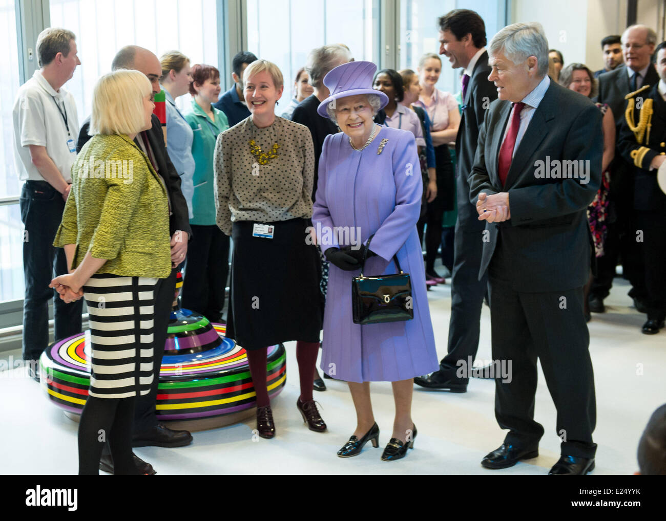 Queen Elizabeth II and Prince Philip, Duke of Edinburgh meet staff as ...