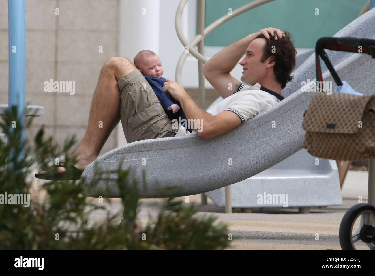 Former tennis star Carlos Moya spends the day with his family while on ...