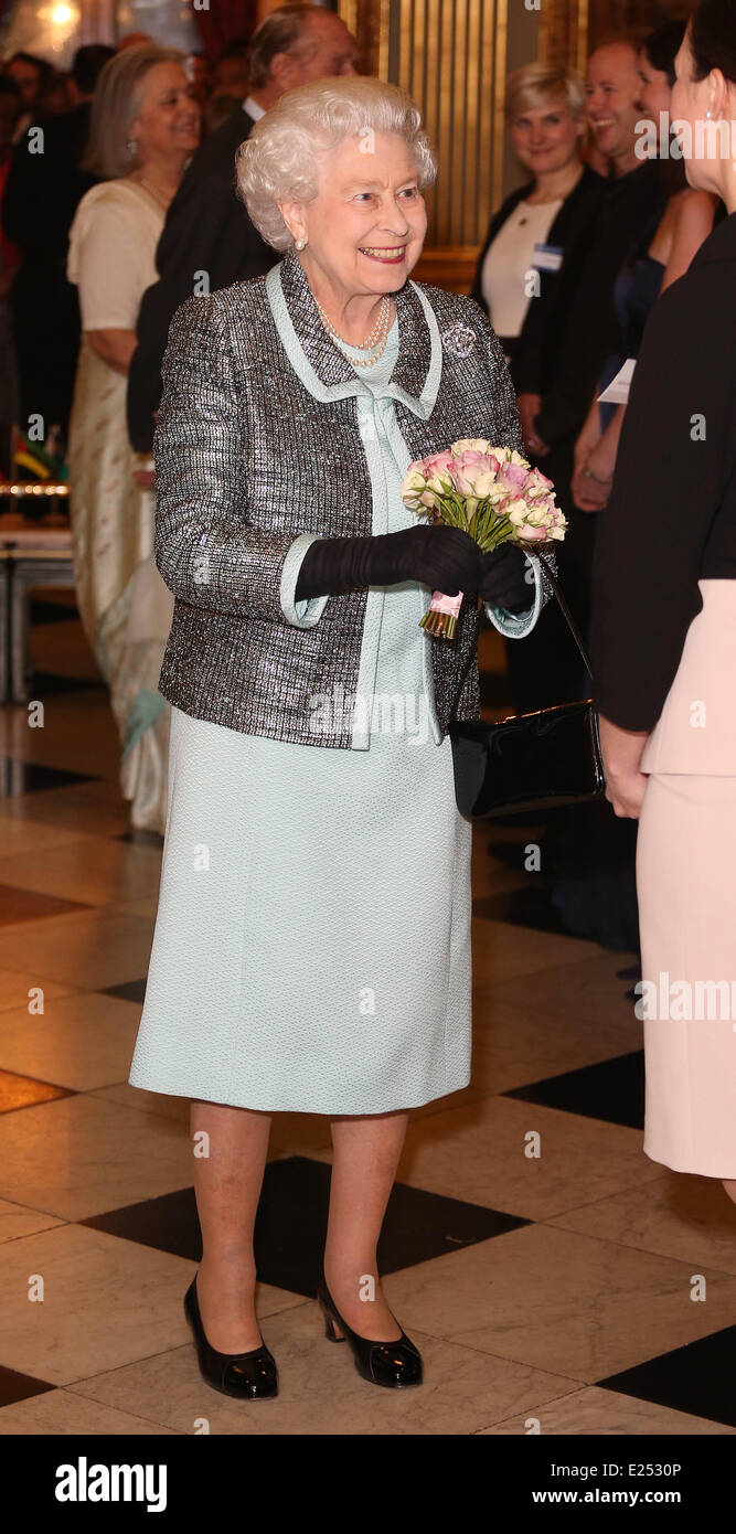 Queen Elizabeth II, Head of the Commonwealth receives a posy at a ...