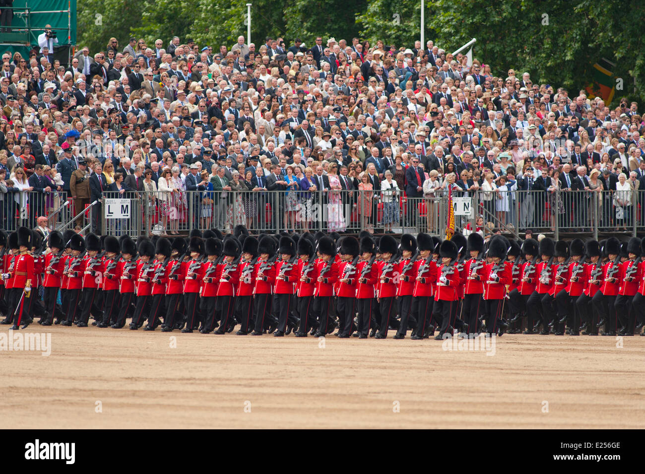 Guards marching in front of spectators in the stands at The Queen’s ...