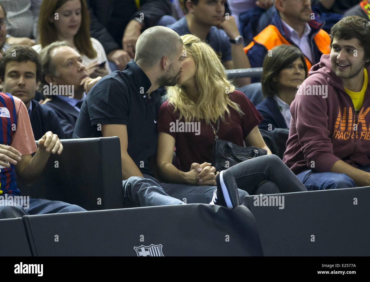 Shakira and boyfriend Gerard Pique look very much in love as they watch ...