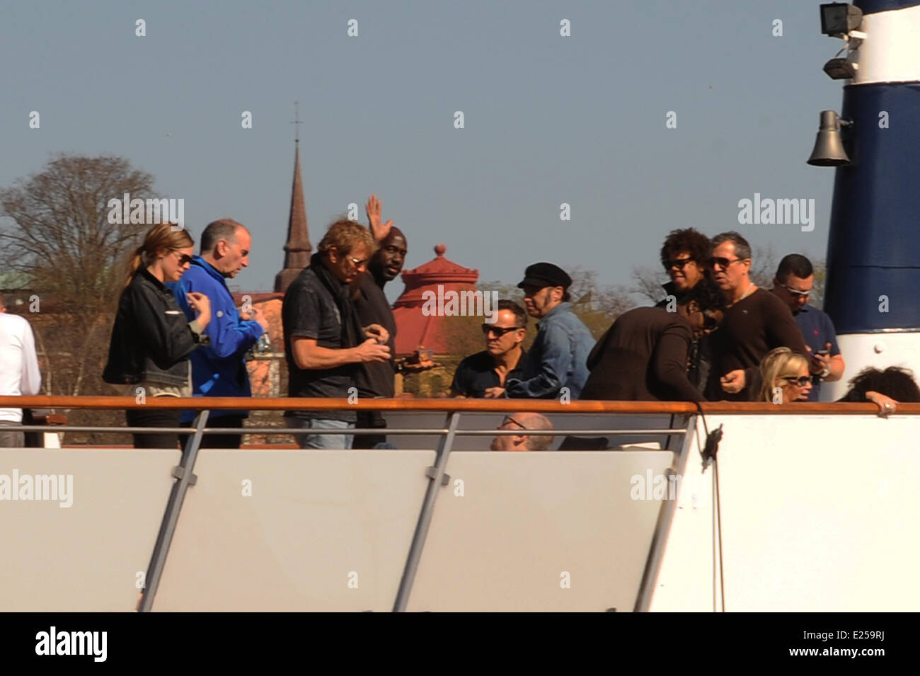 Bruce Springsteen and his crew enjoy a sightseeing tour on a boat in ...