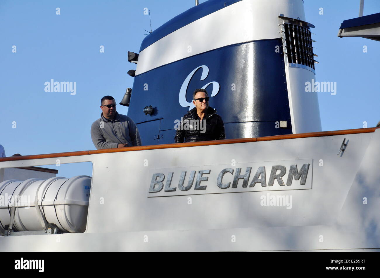 Bruce Springsteen and his crew enjoy a sightseeing tour on a boat in ...