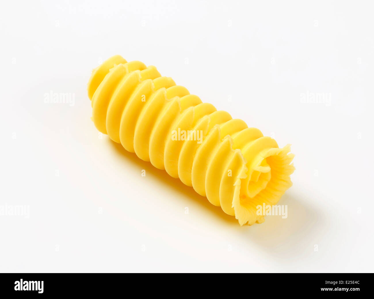 Studio shot of butter curl Stock Photo - Alamy
