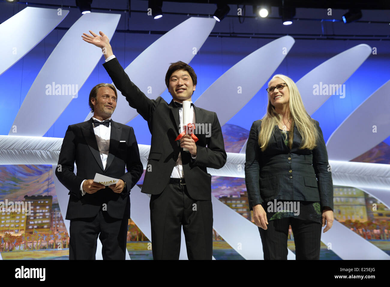 Korean director Moon Byung-gon celebrates on stage with Danish actor ...