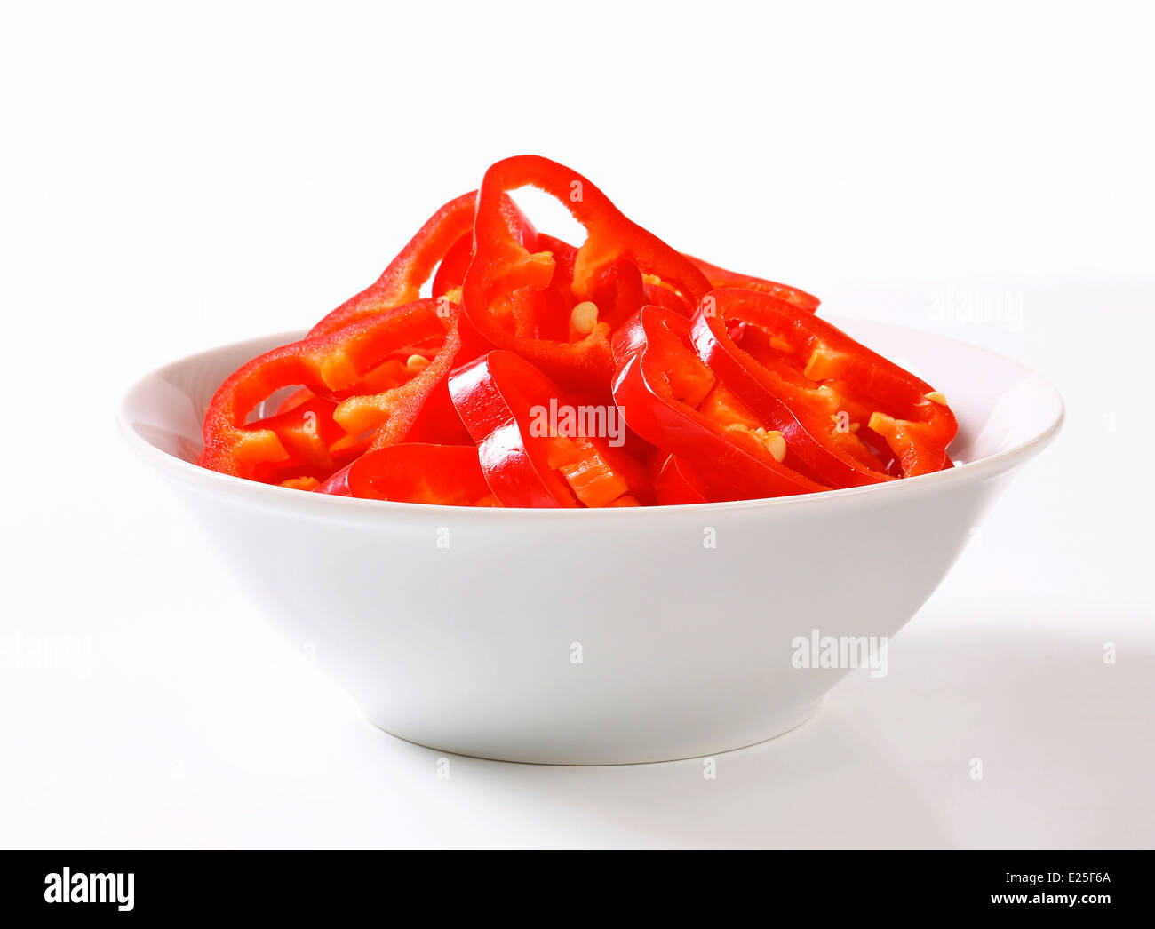 Bowl of sliced red bell pepper Stock Photo - Alamy