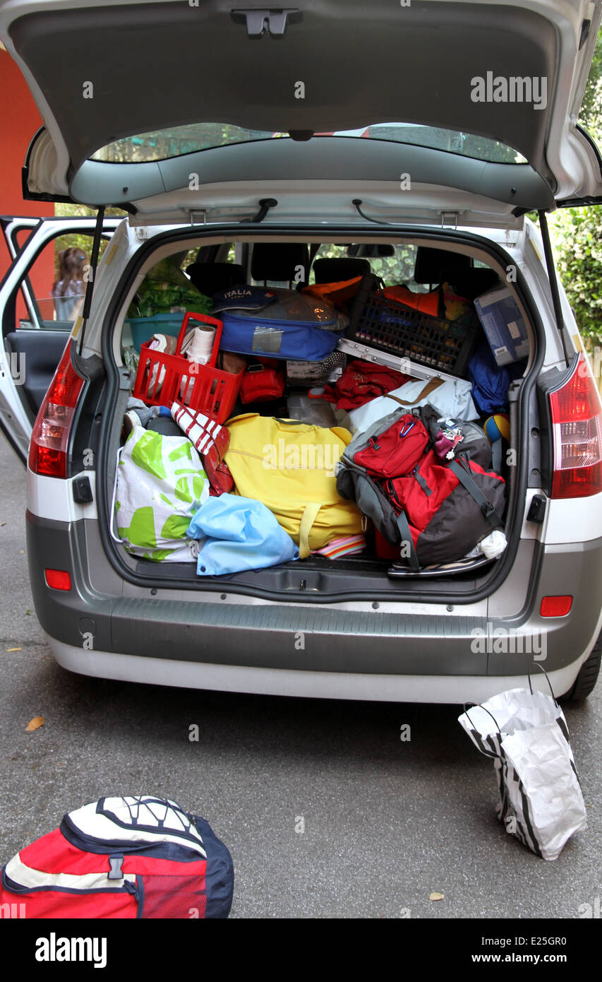 trunk full of luggage and bag of the family before leaving for summer ...