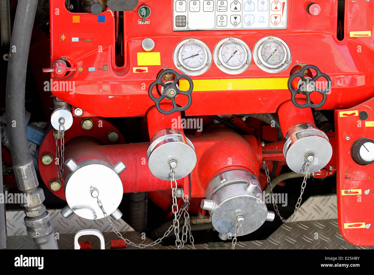 taps and valves of trucks of firefighters with measuring gauges water ...