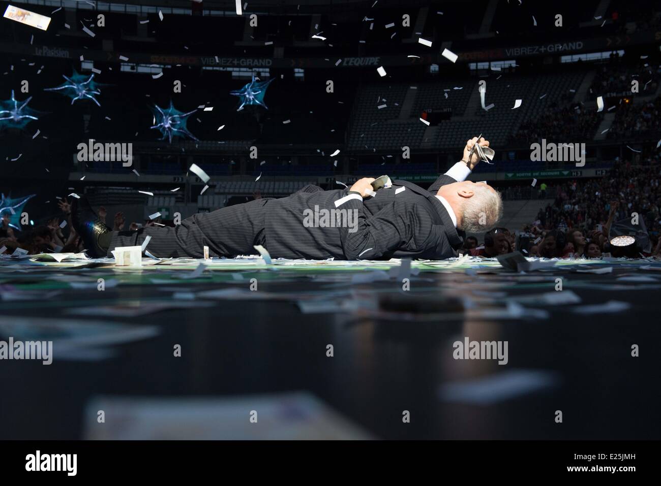 Muse perform live in concert at the Stade de France. An actor throws ...