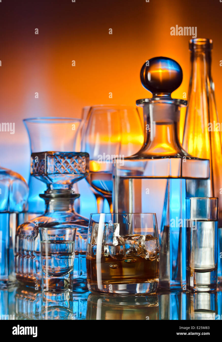 alcoholic drinks in bar on glass table Stock Photo - Alamy