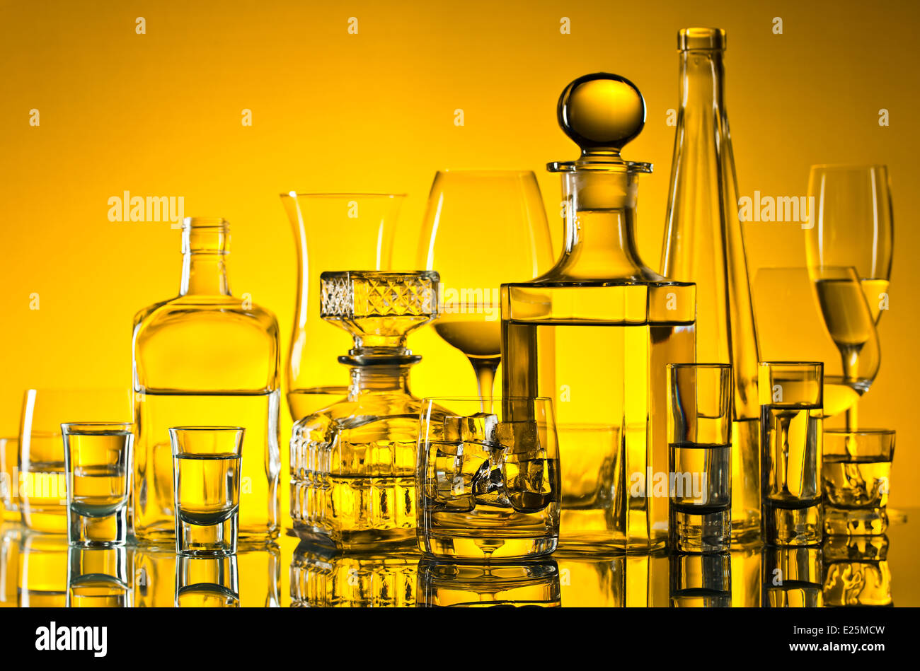 alcoholic drinks in bar on glass table Stock Photo - Alamy