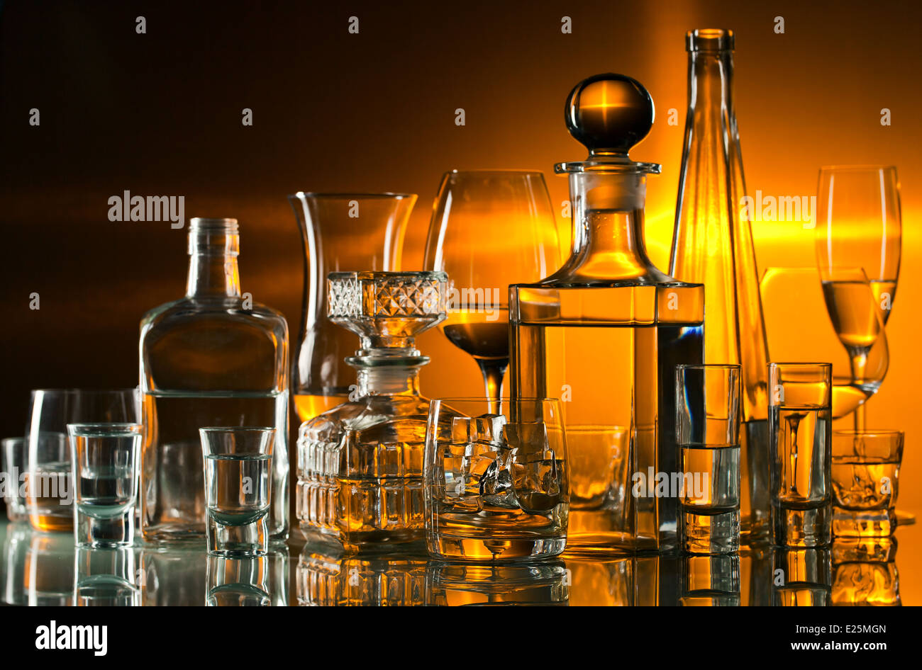 alcoholic drinks in bar on glass table Stock Photo - Alamy