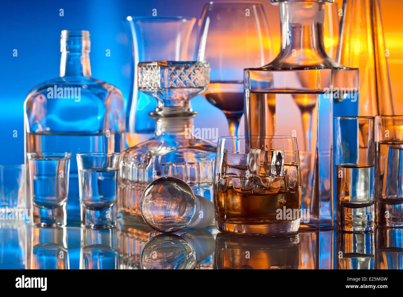 alcoholic drinks in bar on glass table Stock Photo - Alamy