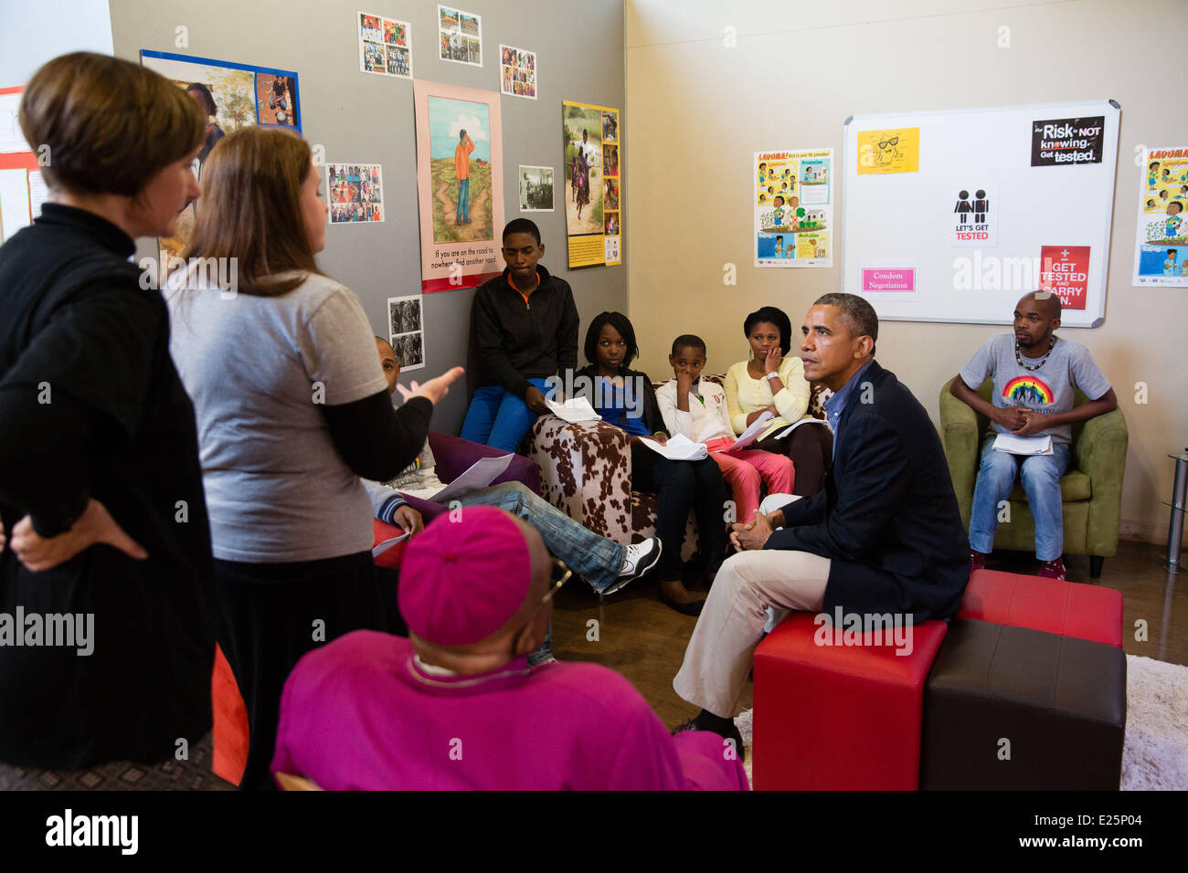 President Barack Obama talks with students in a health education class ...