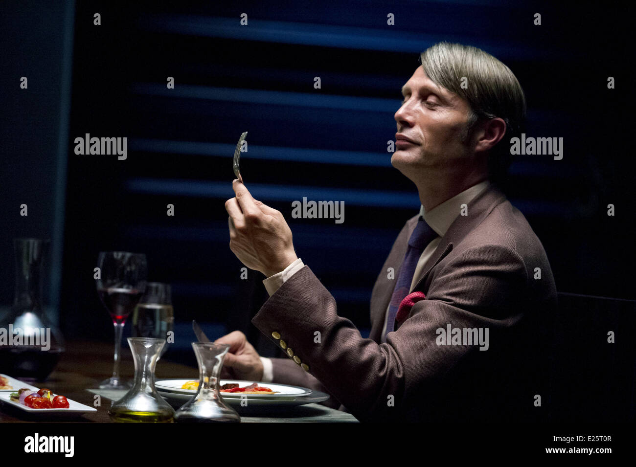 Mads Mikkelsen as Dr. Hannibal Lecter in the television series of ...