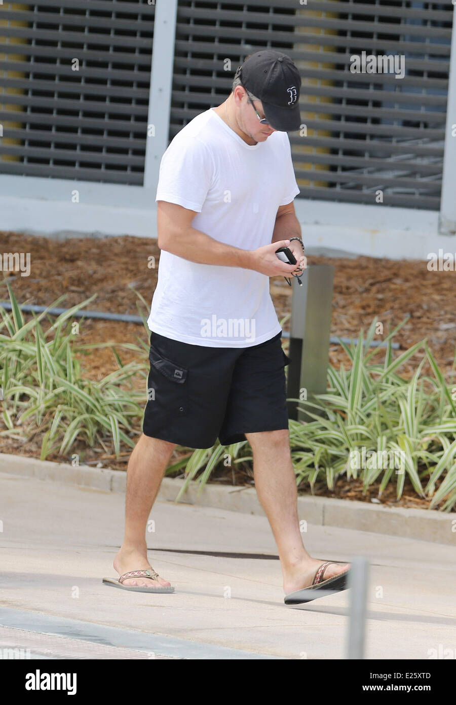 Actor Matt Damon spends a day at the pool with his family and friends ...