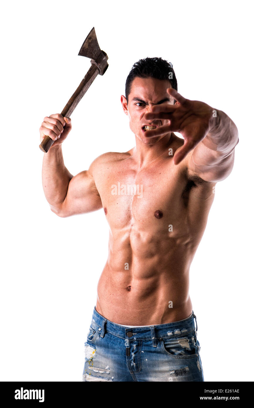 Aggressive, violent muscular young man shirtless, holding axe in his ...