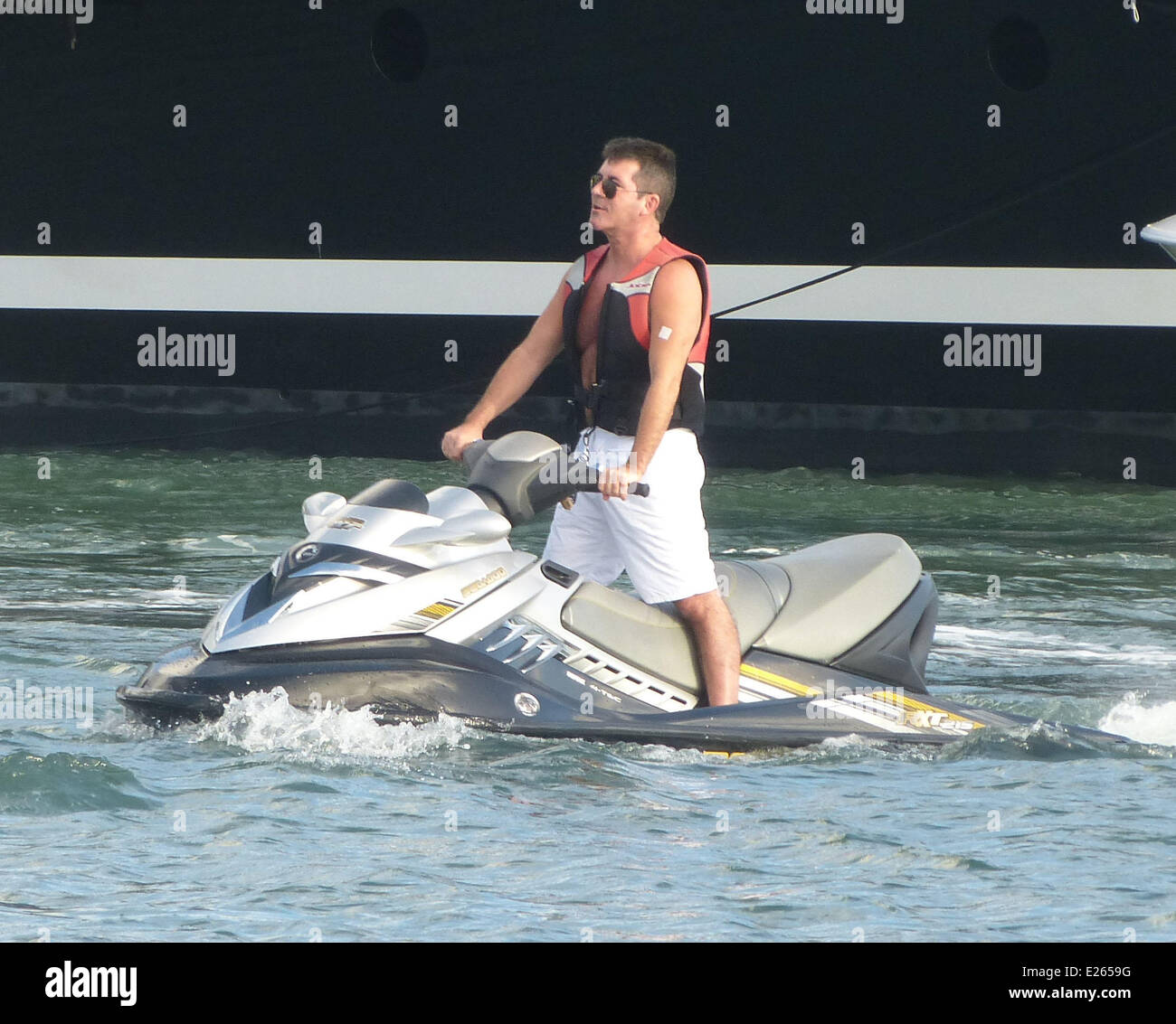 Simon Cowell rides his jet-ski while on holiday in St Barts Featuring ...