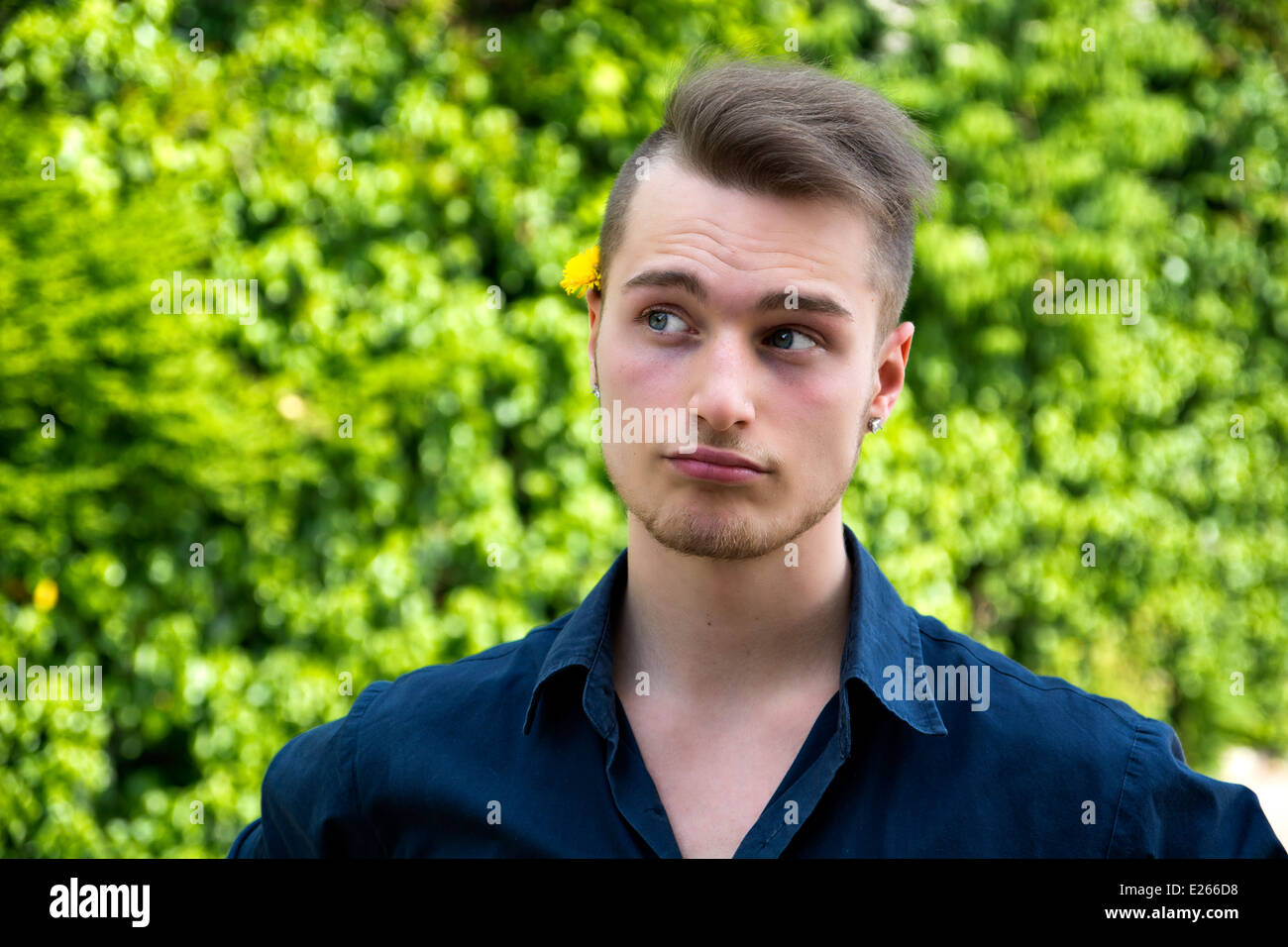 Man unsure outdoors hi-res stock photography and images - Alamy