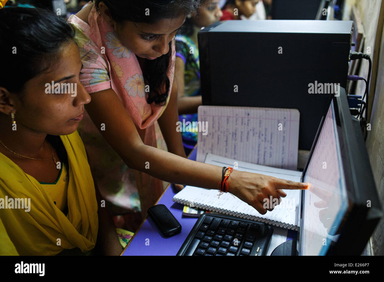 A computer literacy class run by a local NGO for adults in Kandivali ...