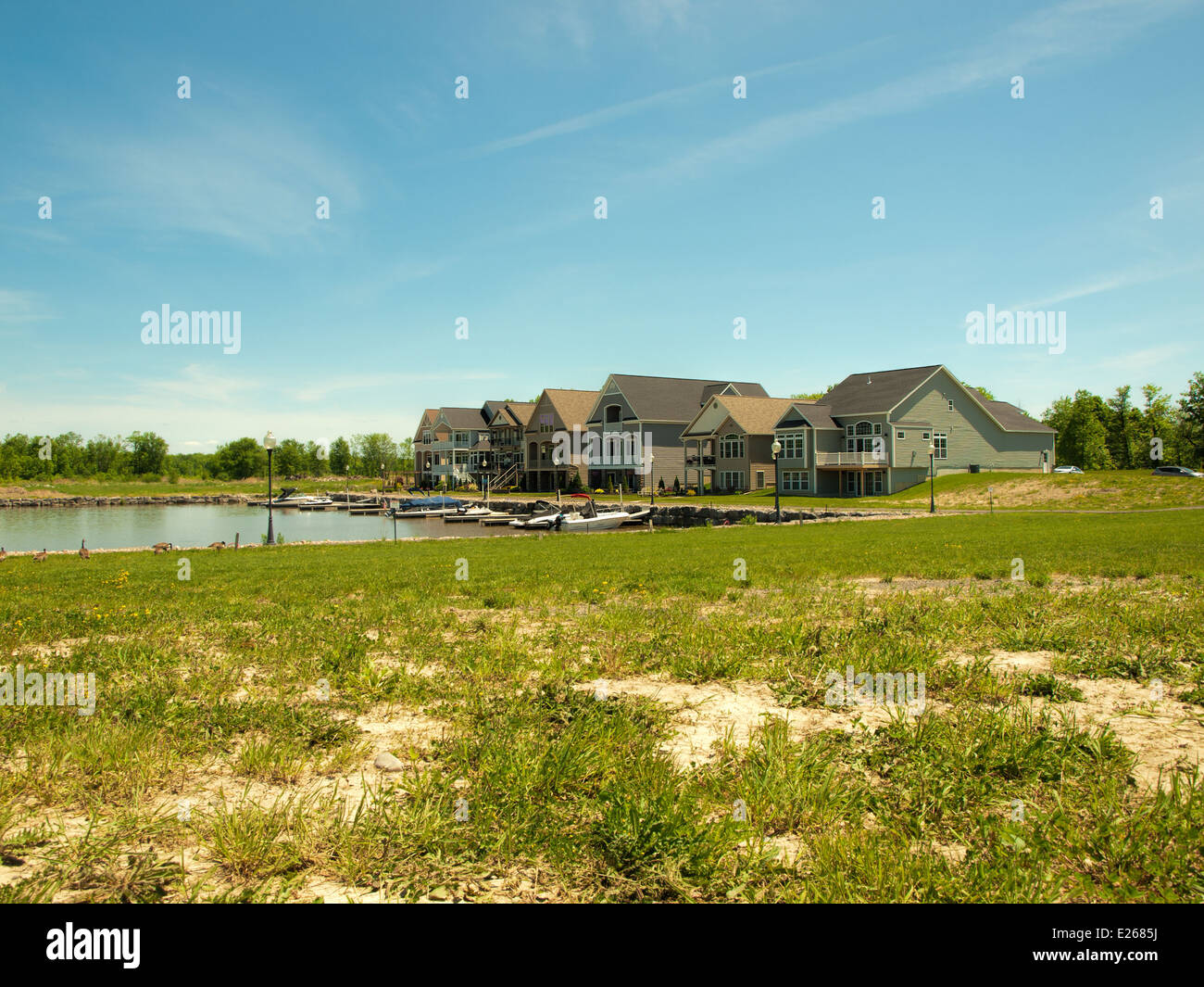 newly built harbor side homes Stock Photo - Alamy