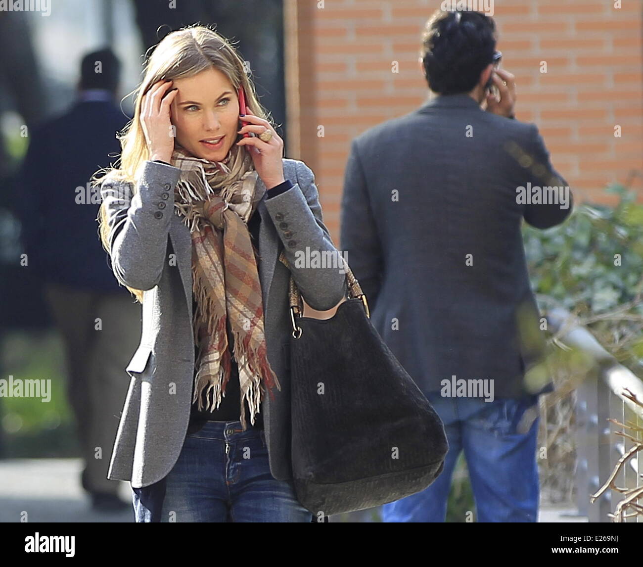 Footballer Luis Figo and his wife Helen Svedin are seen out and about ...