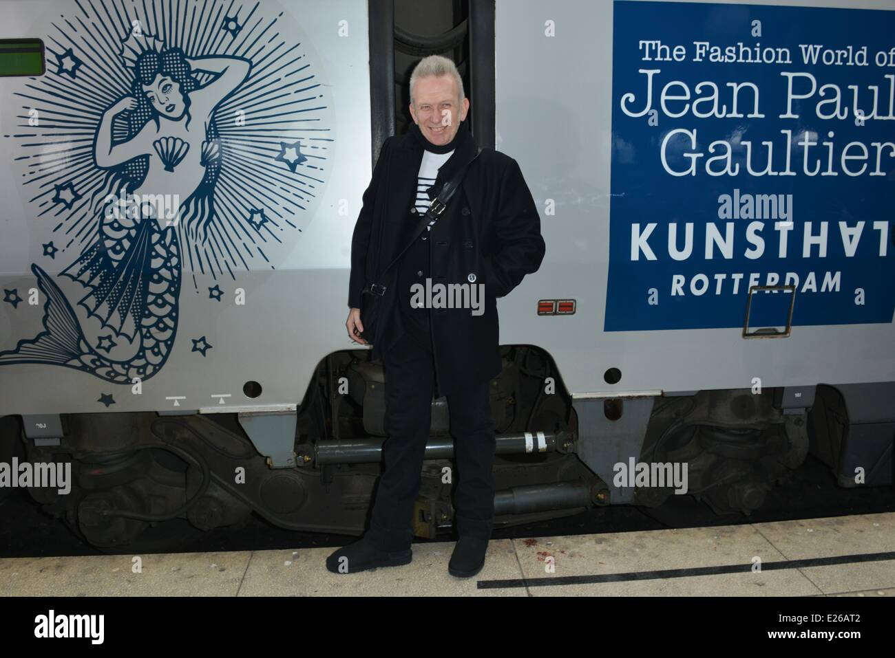 French designer Jean-Paul Gaultier signs a drawing and his autograph on ...