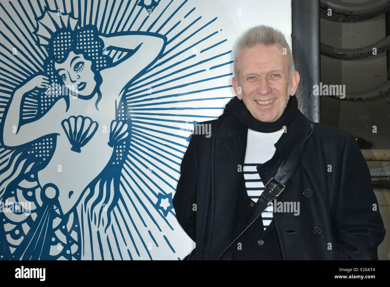 French designer Jean-Paul Gaultier signs a drawing and his autograph on ...