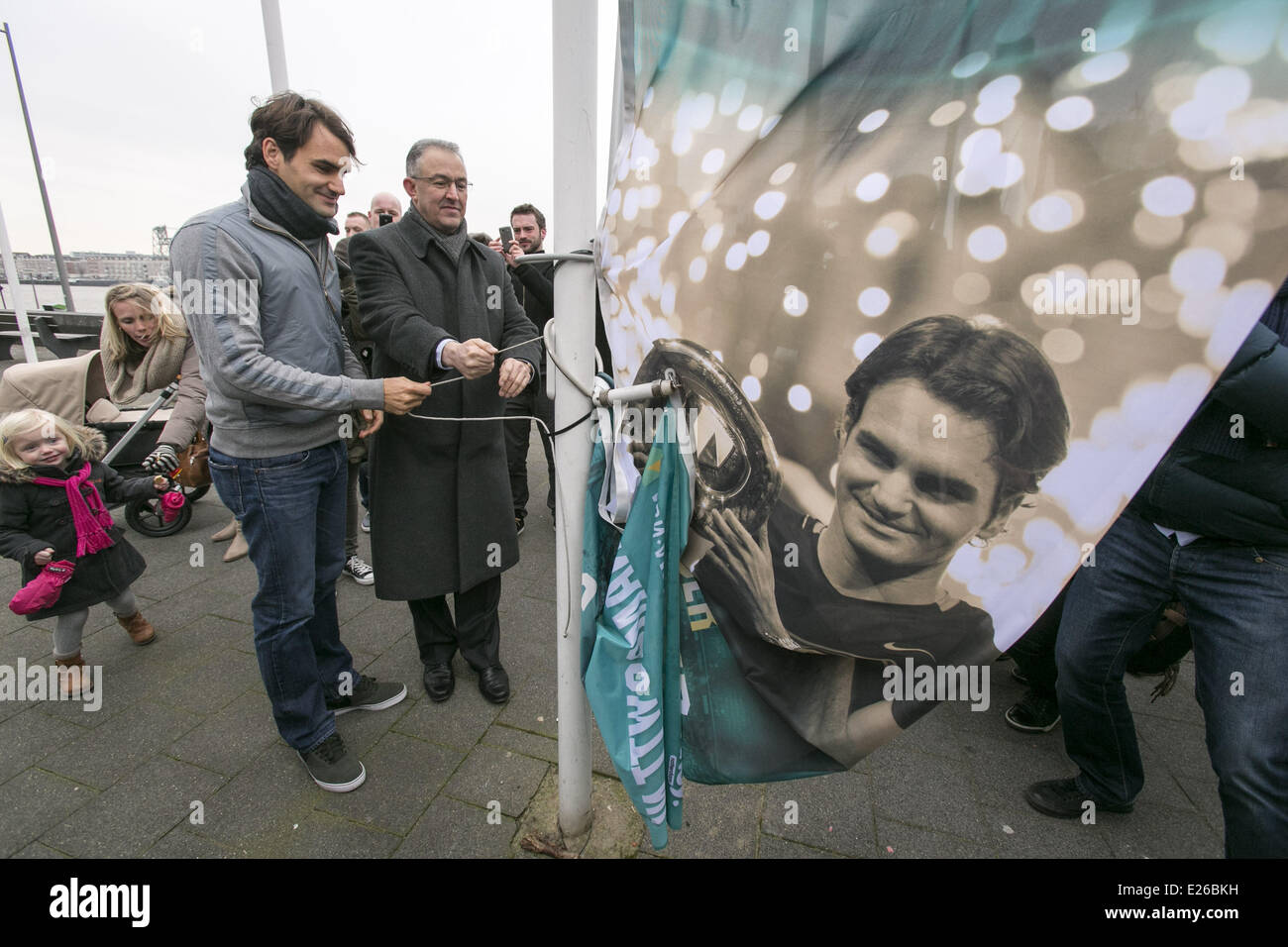 Roger Federer helps the mayor of Rotterdam, Ahmed Aboutaleb and ...