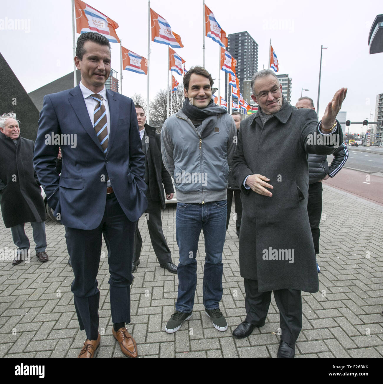 Roger Federer helps the mayor of Rotterdam, Ahmed Aboutaleb and ...