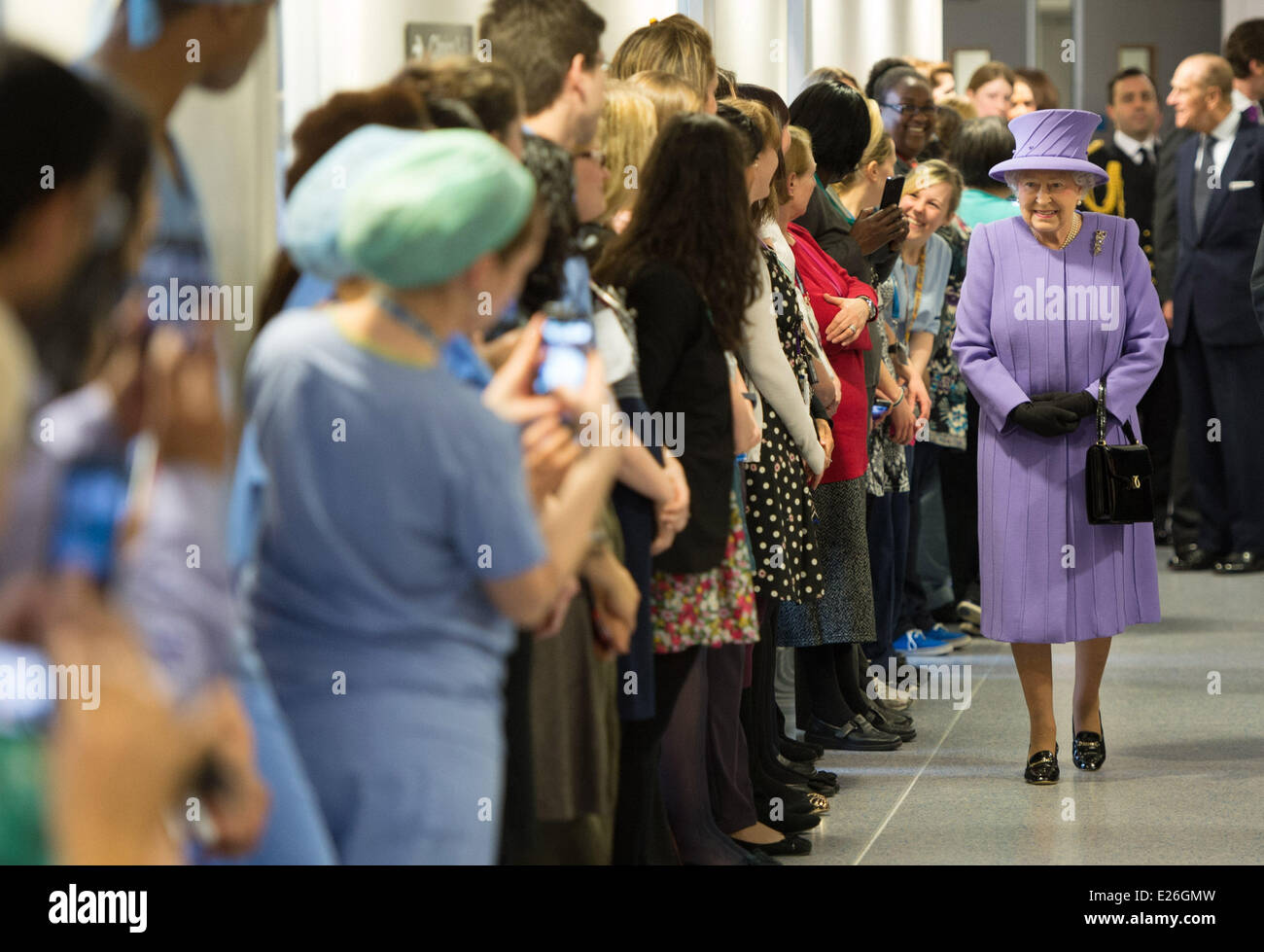 Queen Elizabeth II and Prince Philip, Duke of Edinburgh meet staff as ...