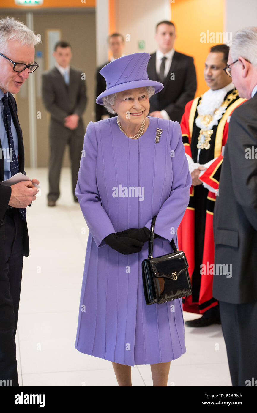 Queen Elizabeth II and Prince Philip, Duke of Edinburgh meet staff as ...