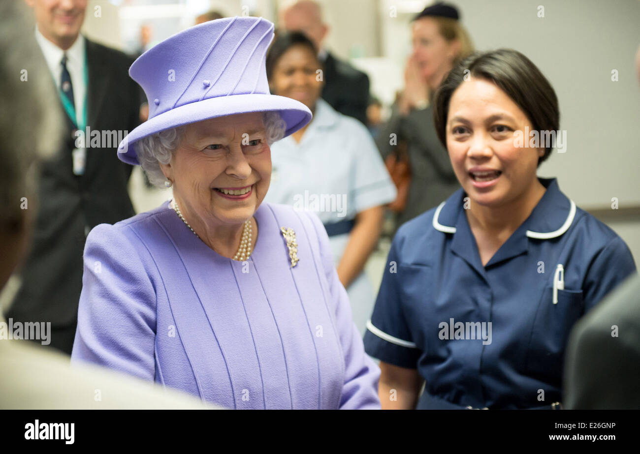 Queen Elizabeth II and Prince Philip, Duke of Edinburgh meet staff as ...