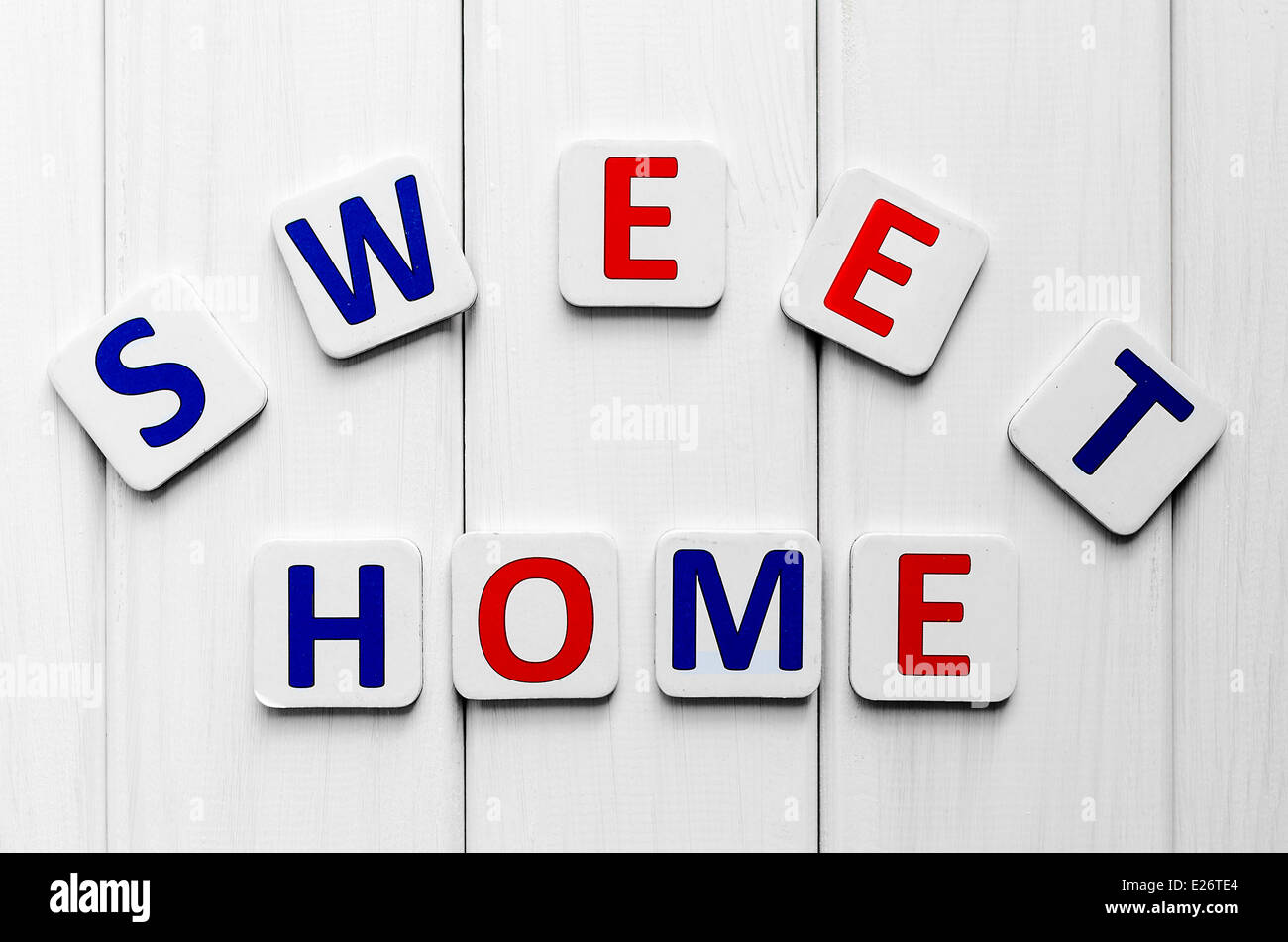 Sweet home word, composed of letters on a background of wood Stock ...