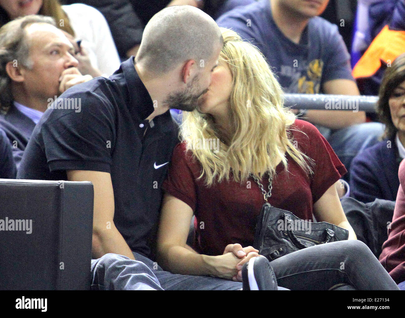 Shakira and boyfriend Gerard Pique look very much in love as they watch ...
