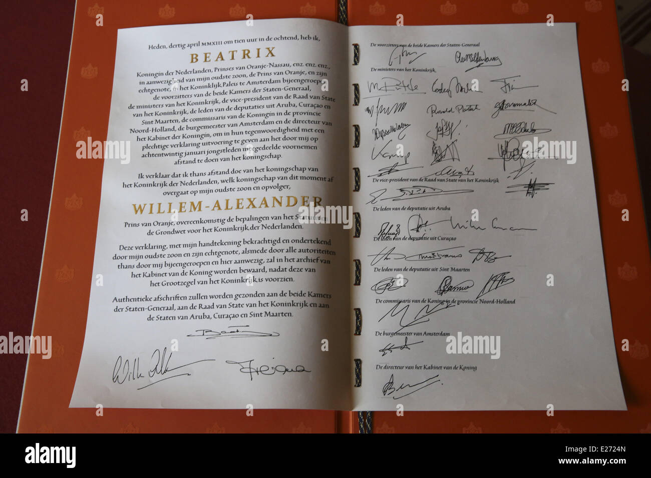 Queen Beatrix signs the Act of Abdication in favour of her son, Prince ...