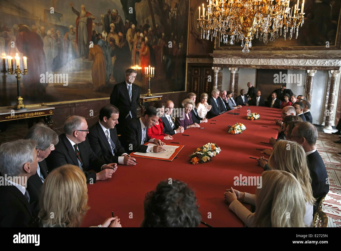 Queen Beatrix signs the Act of Abdication in favour of her son, Prince ...