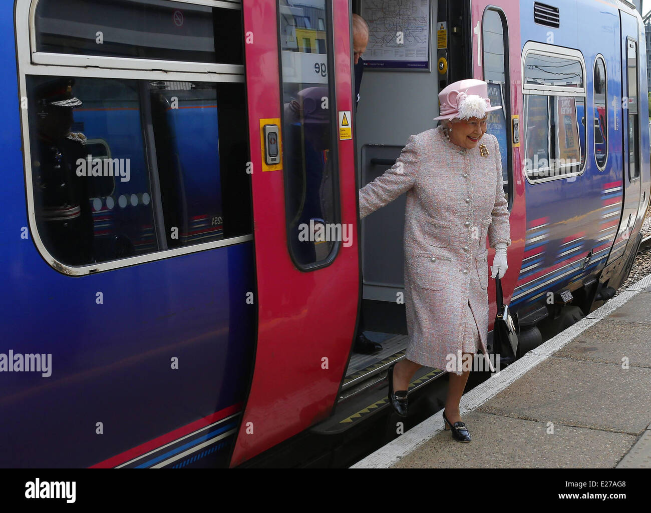 CAMBRIDGE - UK -23 MAY 2013: ROTA: Queen Elizabeth II accompanied by ...