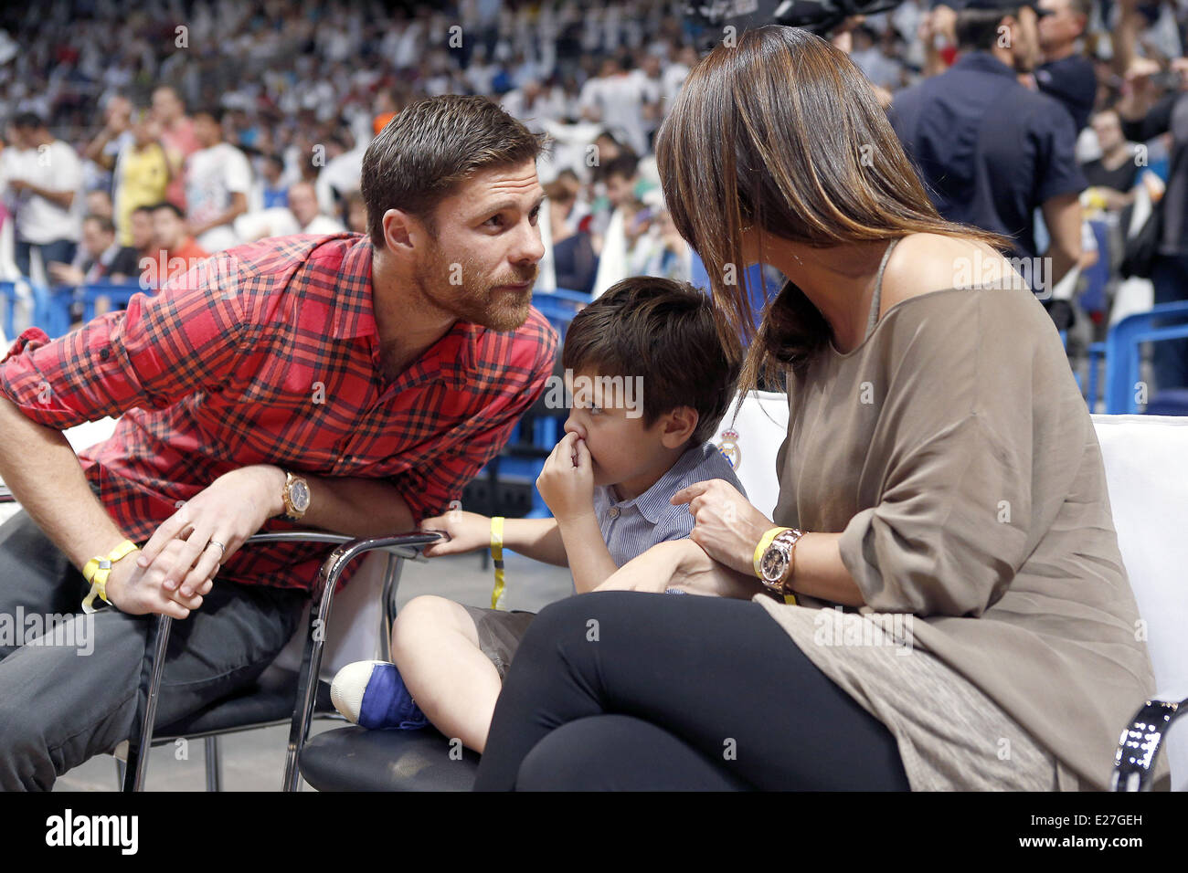 Real Madrid Midfielder Xabier Alonso and his family watch a basketball ...