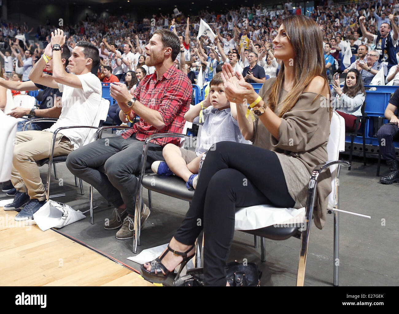 Real Madrid Midfielder Xabier Alonso and his family watch a basketball ...