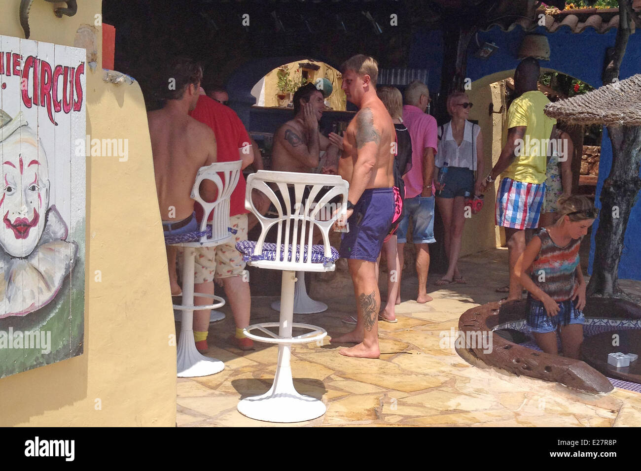 Liam Gallagher relaxes by the pool bar at a Ibiza hotel. The Beady Eye ...