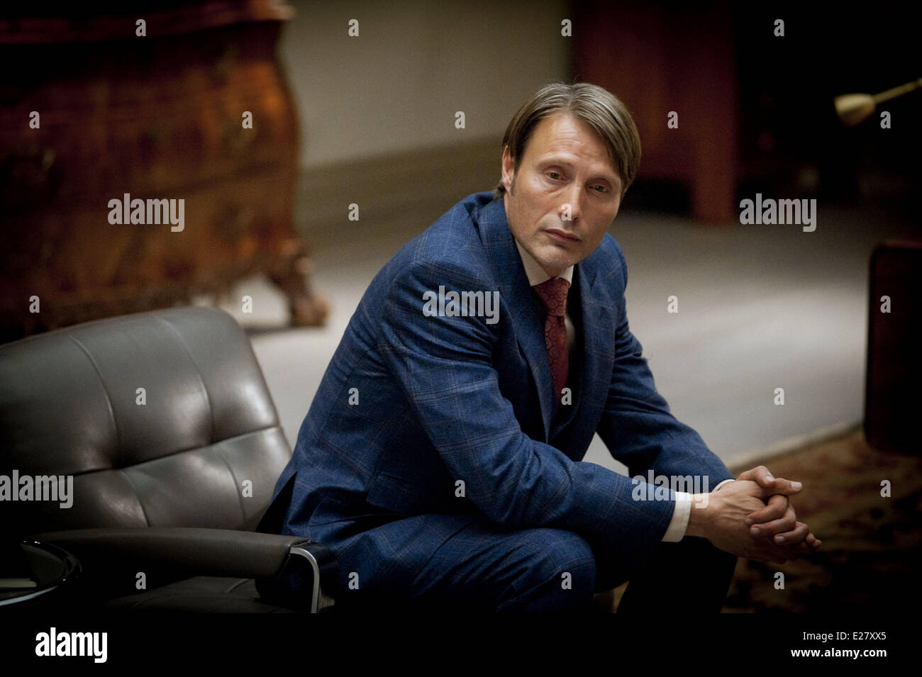 Mads Mikkelsen as Dr. Hannibal Lecter in the television series of ...