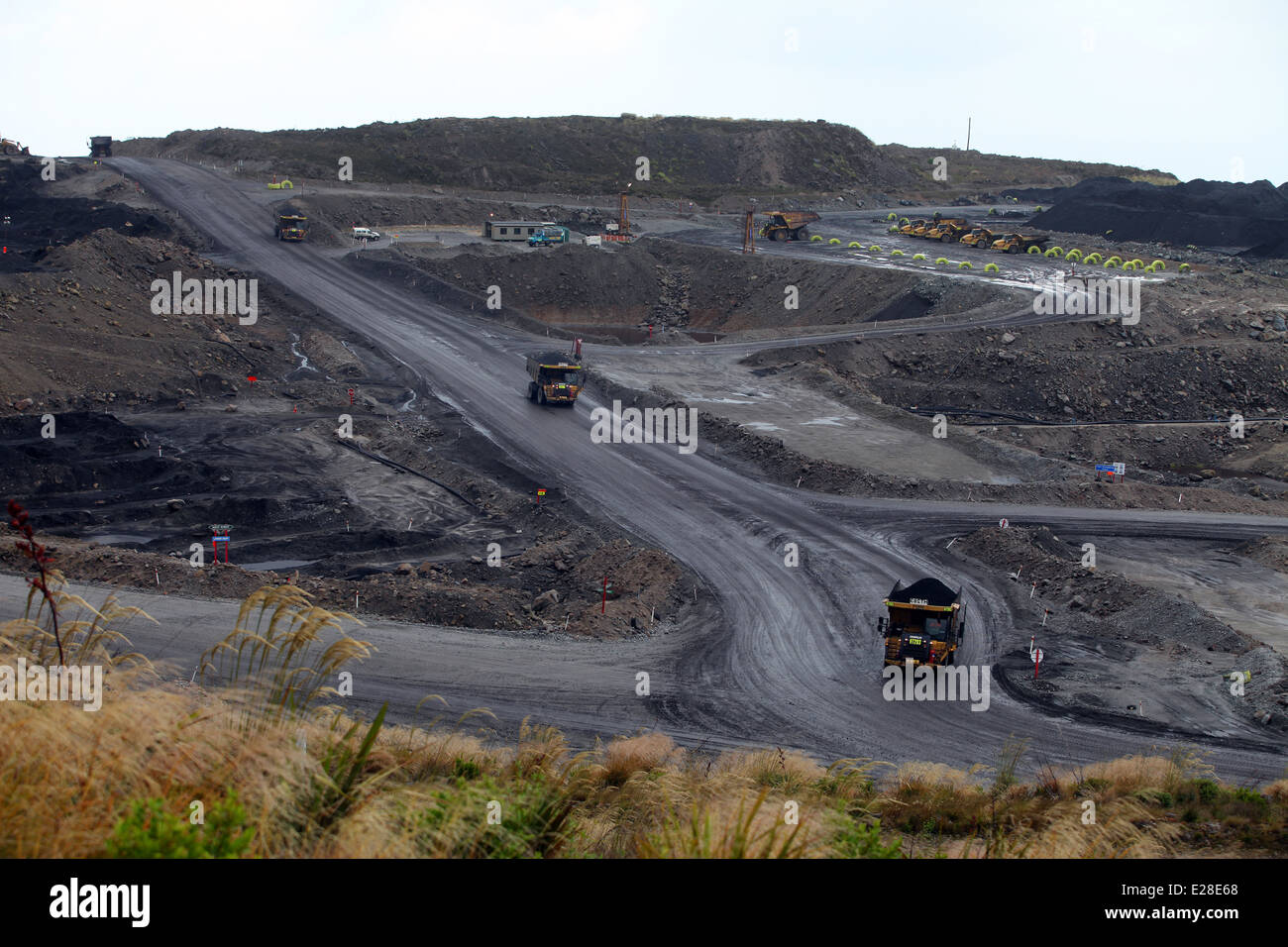 Huge trucks carrying coal in Stockton open cast coal mine, West Coast ...