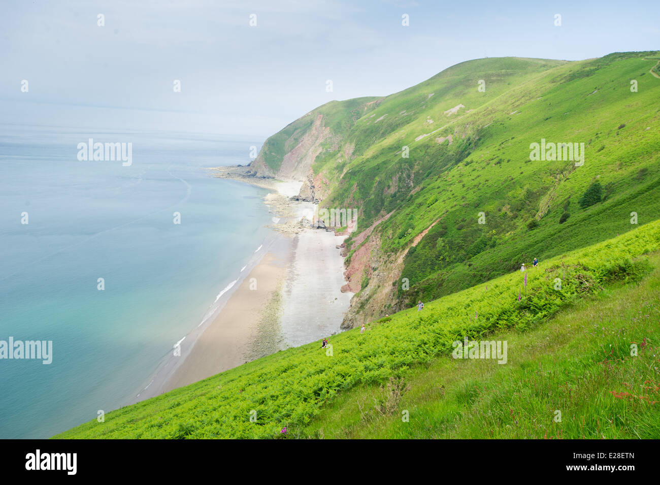 Sun falling dramatically on the Devon coastline just outside Lynmouth ...