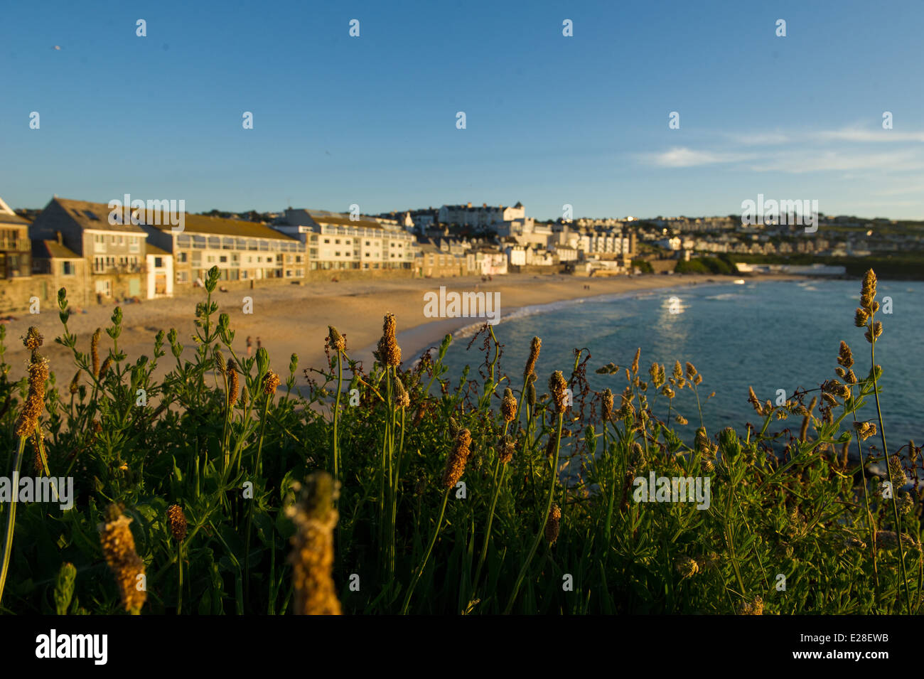 Sunset in St Ives in Cornwall, England, overlooking Porthmeor beach ...