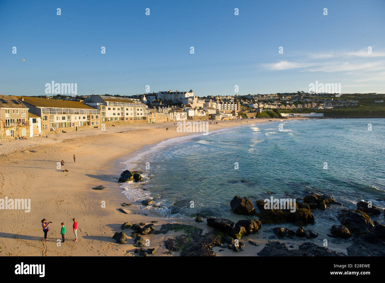 Sunset in St Ives in Cornwall, England, overlooking Porthmeor beach ...